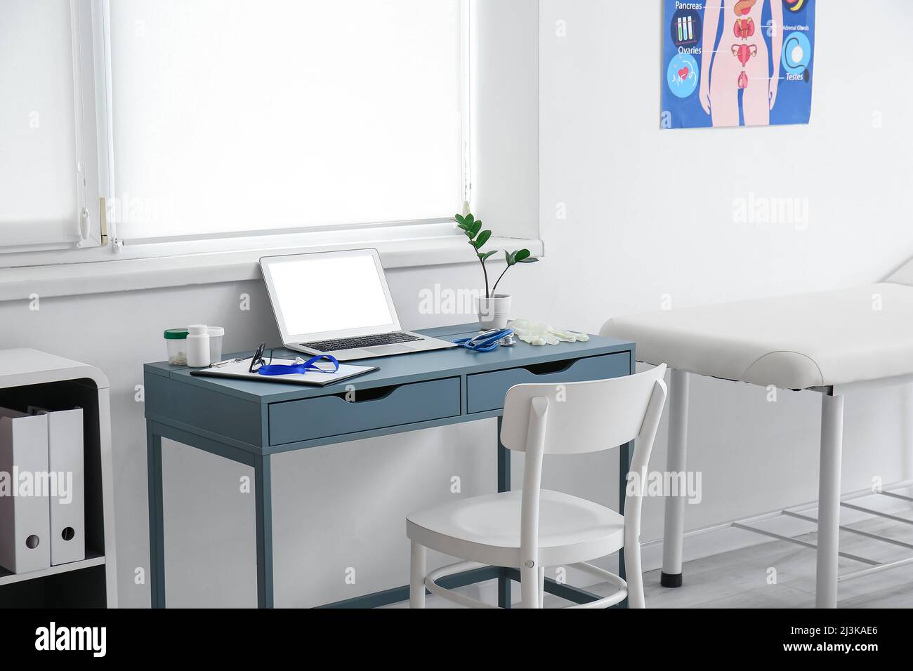Doctor's workplace with laptop and big window in medical office Stock ...