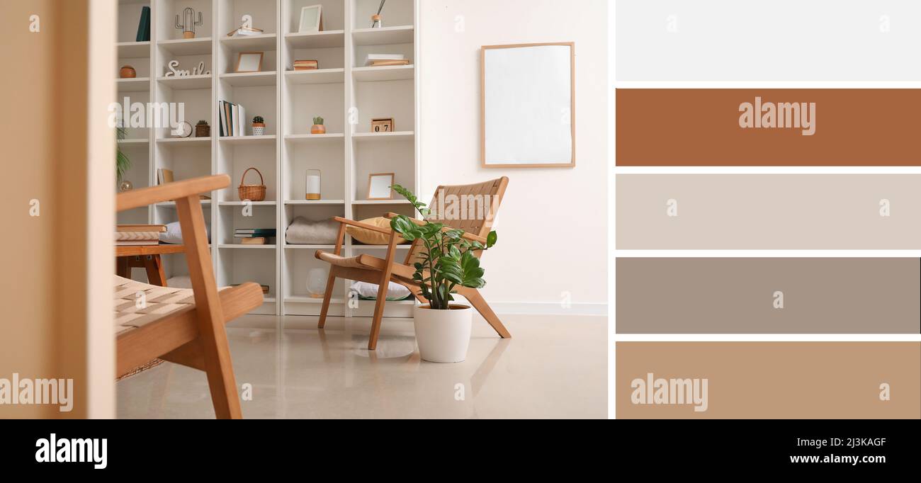 Interior of light living room with shelving unit and armchairs ...