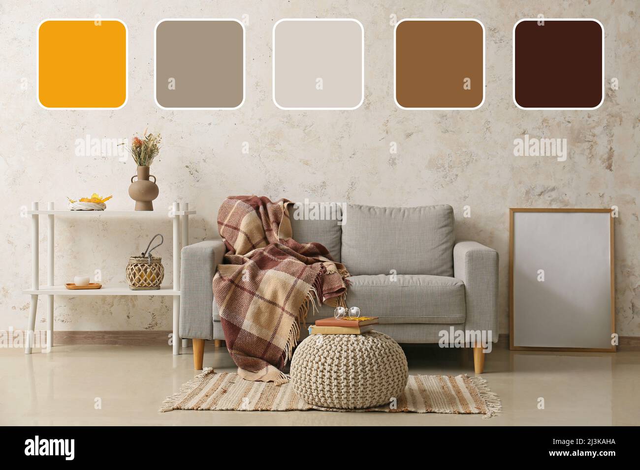 Interior of modern living room with sofa, pouf and shelf unit ...