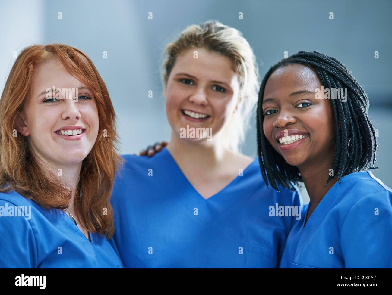 Three times the surgical skill. Portrait of a team of confident young ...