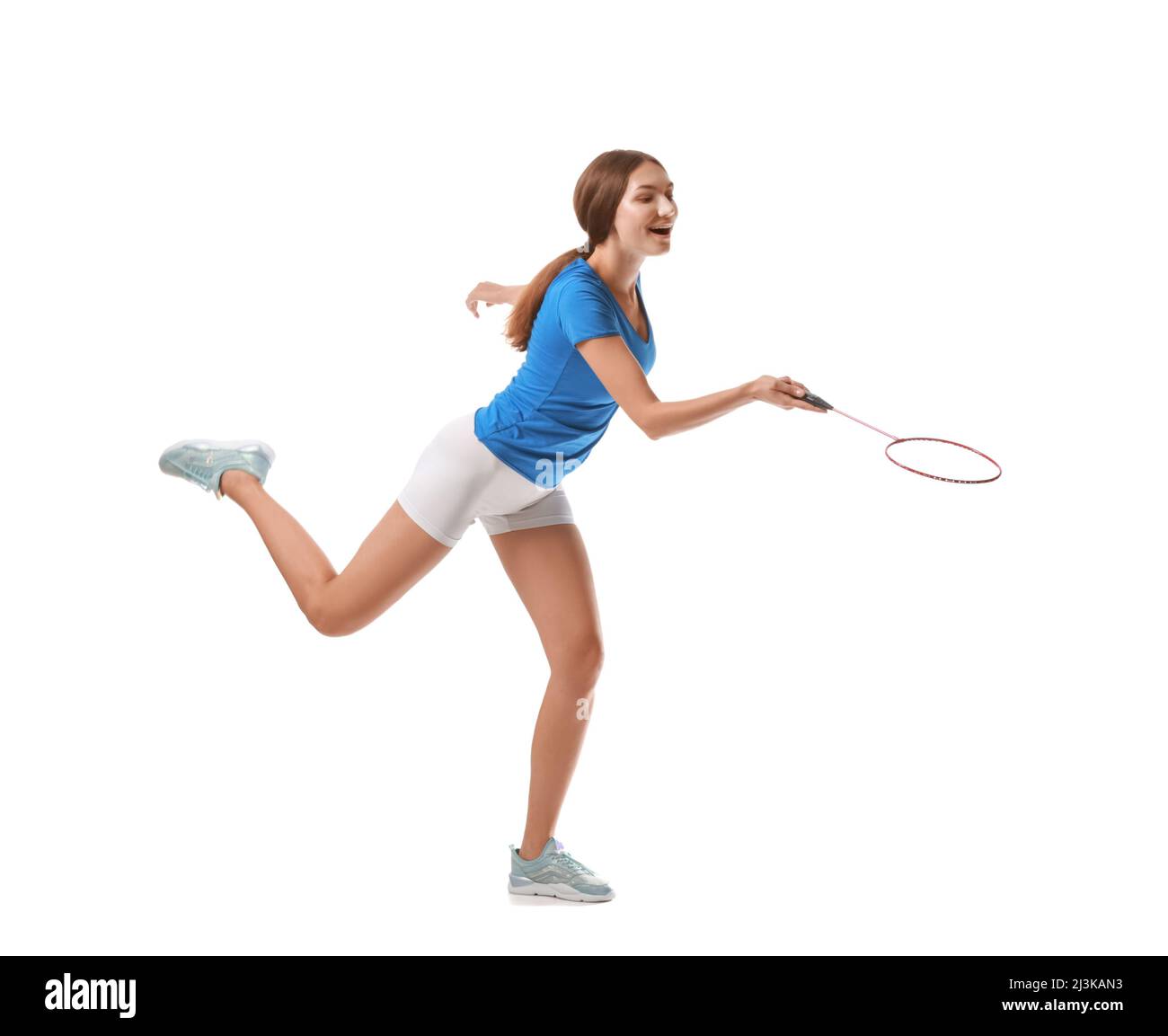 Sporty female badminton player on white background Stock Photo - Alamy