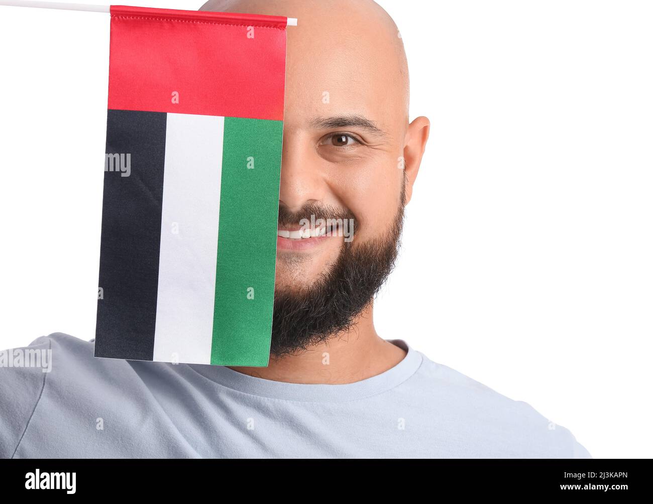 Man with the national flag of UAE on white background Stock Photo - Alamy