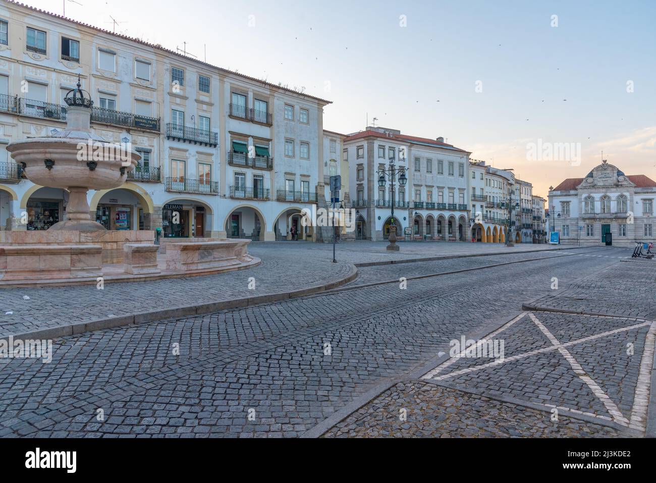 Evora, Portugal, June 15, 2021: Morning at Praca do Giraldo square in ... Evora, Portugal, June 15, 2021: Morning at Praca do Giraldo square in ...