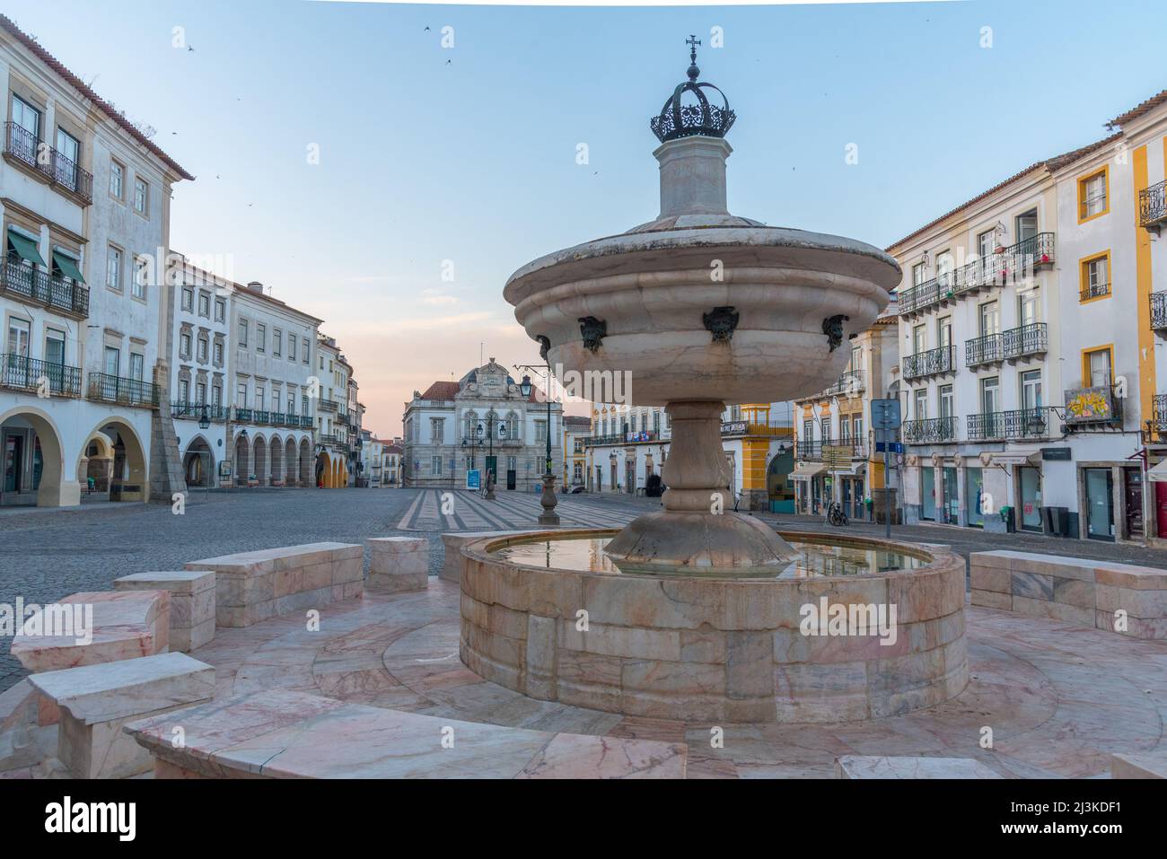 Evora, Portugal, June 15, 2021: Morning at Praca do Giraldo square in ... Evora, Portugal, June 15, 2021: Morning at Praca do Giraldo square in ...