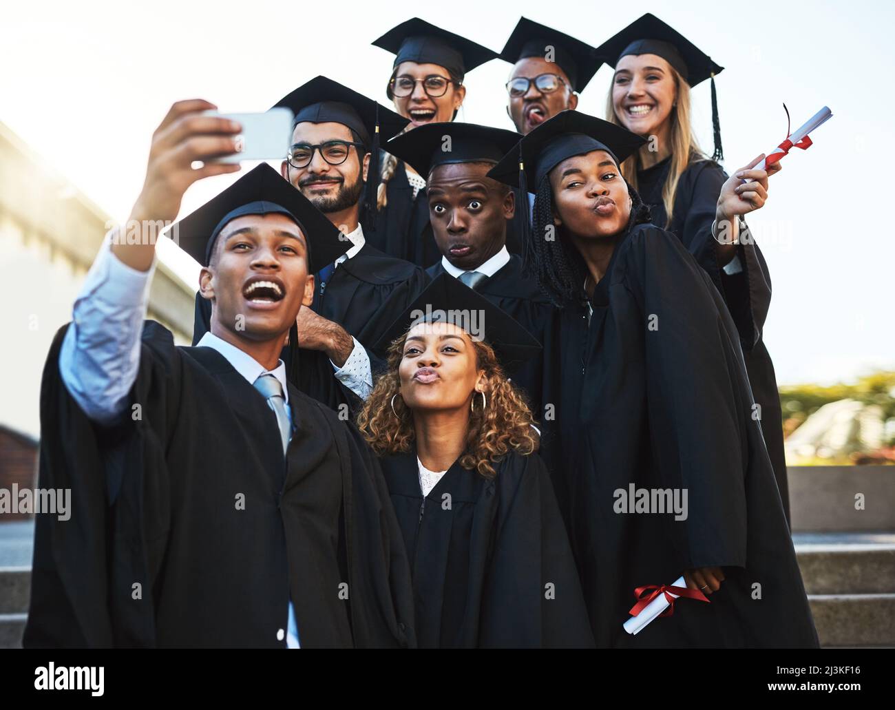 Well never forget this day. Shot of a group of students taking a selfie ...