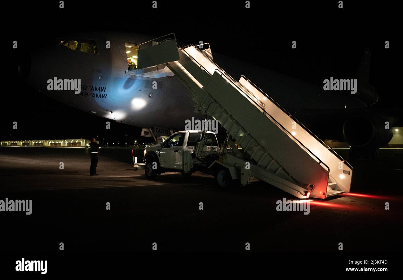 A Flight crew with the 6th Air Refueling Squadron, prepares to exit a ...