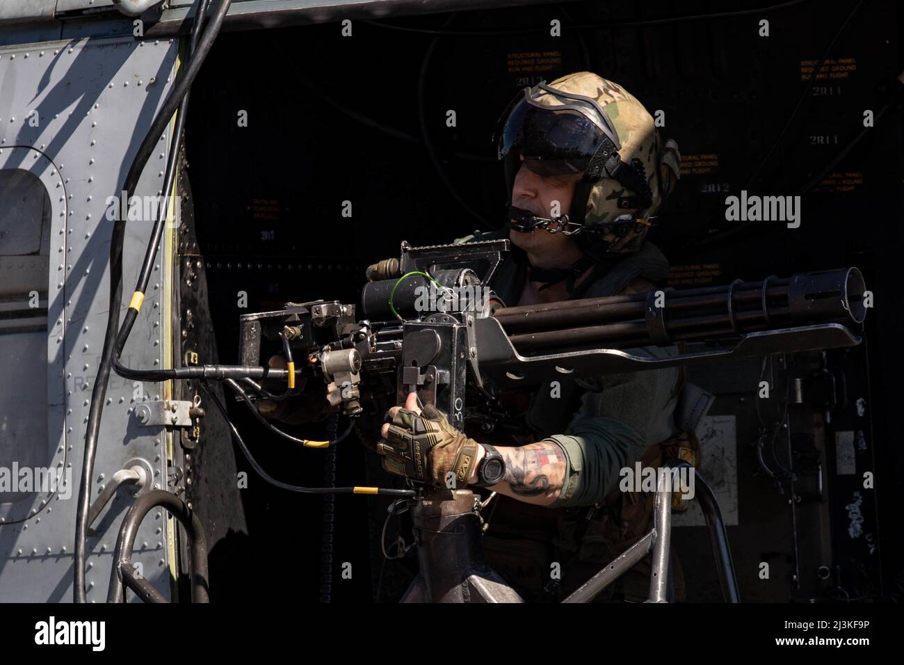 U.S. Marine Staff Sgt. Cody Meggs, a helicopter crew chief with the Air ...