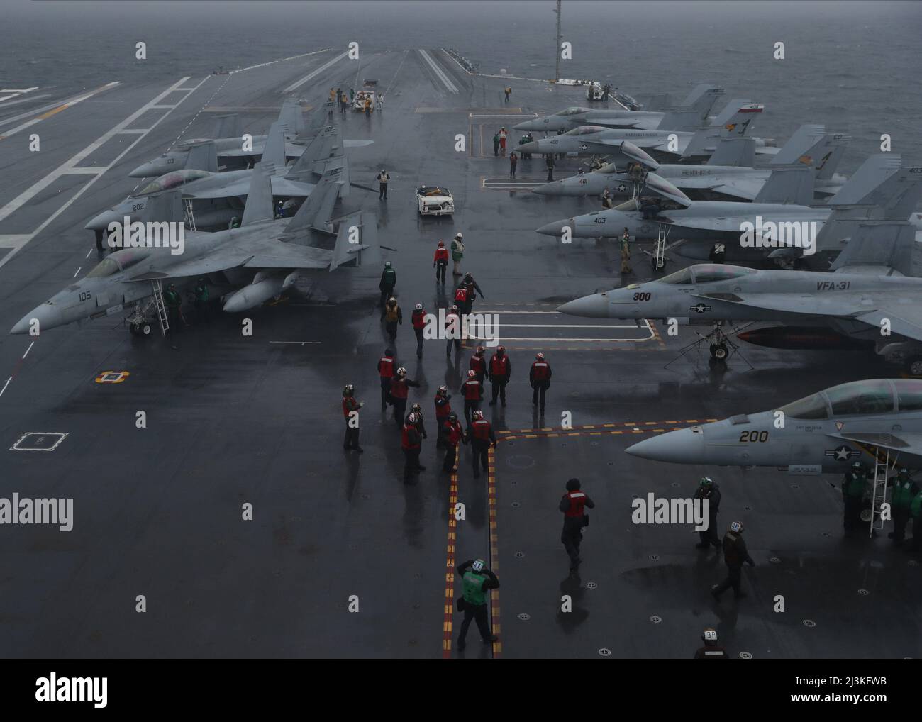 Sailors assigned to USS Gerald R. Ford (CVN 78) and Carrier Air Wing ...