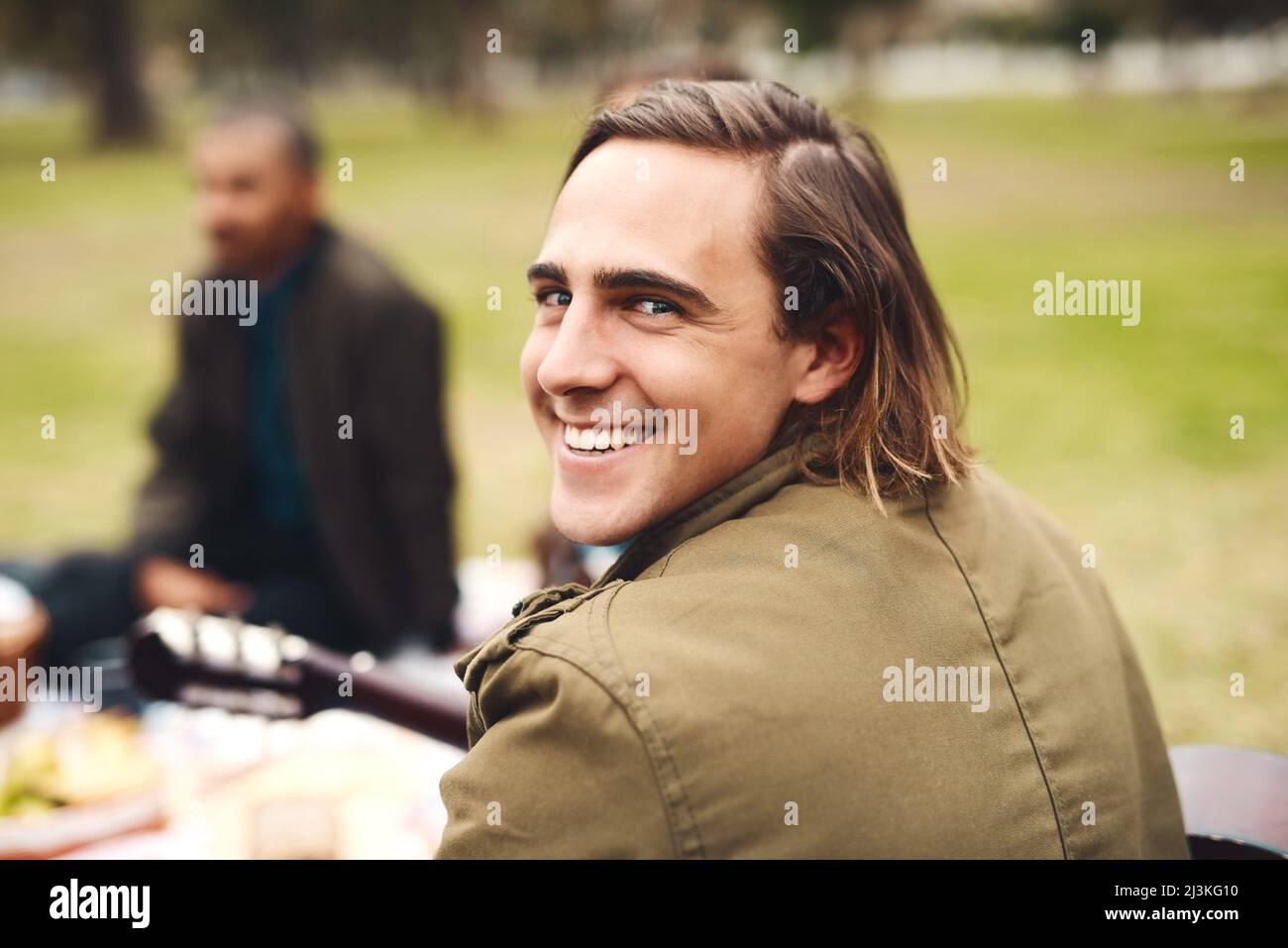 This is how I like to spend my weekends. Portrait of a cheerful young ...