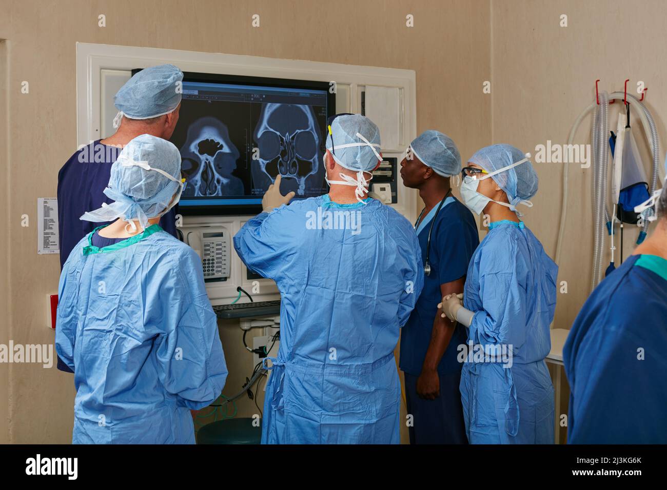 Discussing their options. Shot of a team of surgeons discussing a ...
