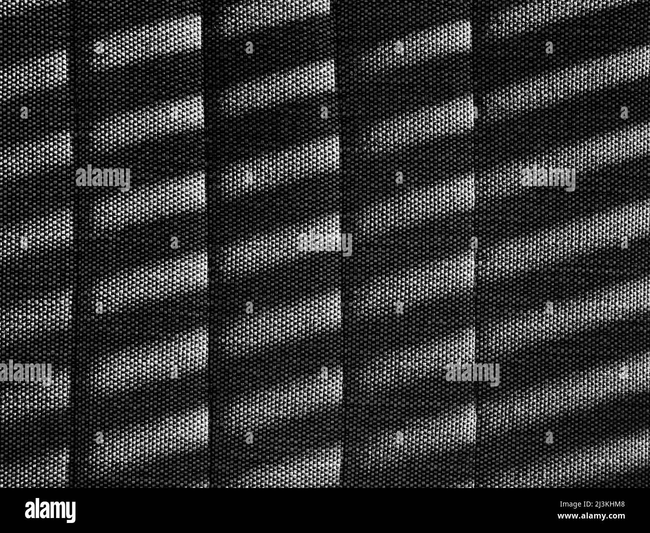 Grid shadow on textile surface Stock Photo - Alamy