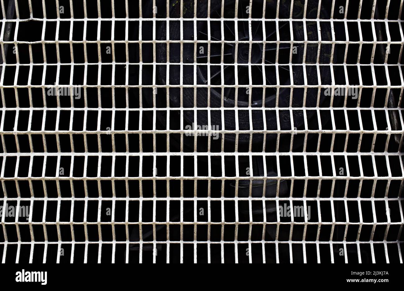 Perforated metallic surface texture background, grid on bus engine ...