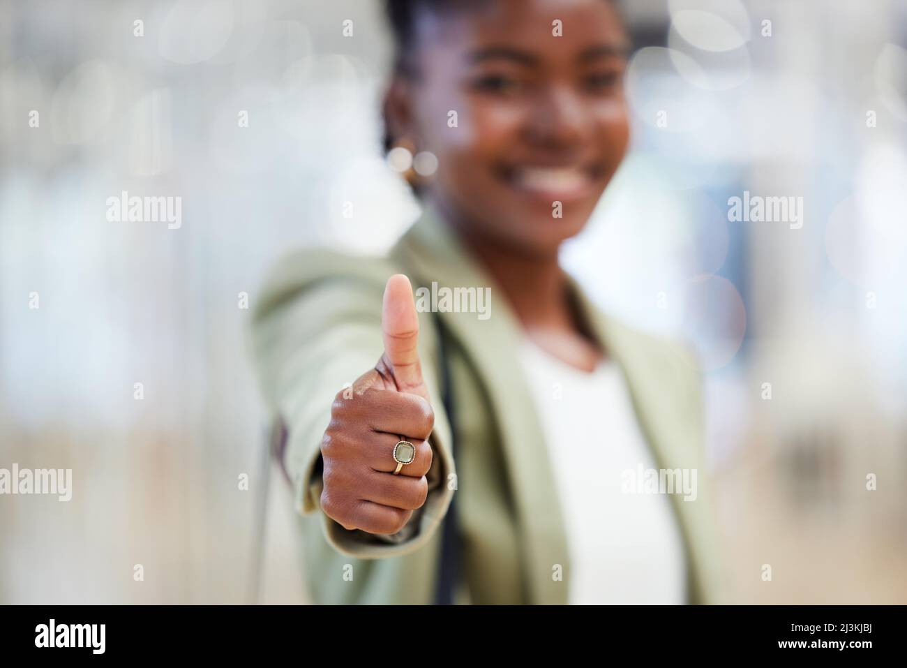 Together well take over the world. Shot of a young woman giving the ...