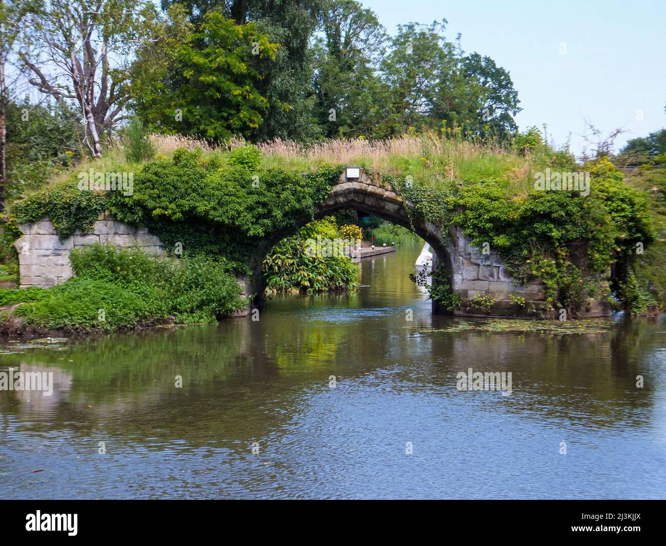 The medieval Old Castle Bridge stands in ruins in the waters of the ...