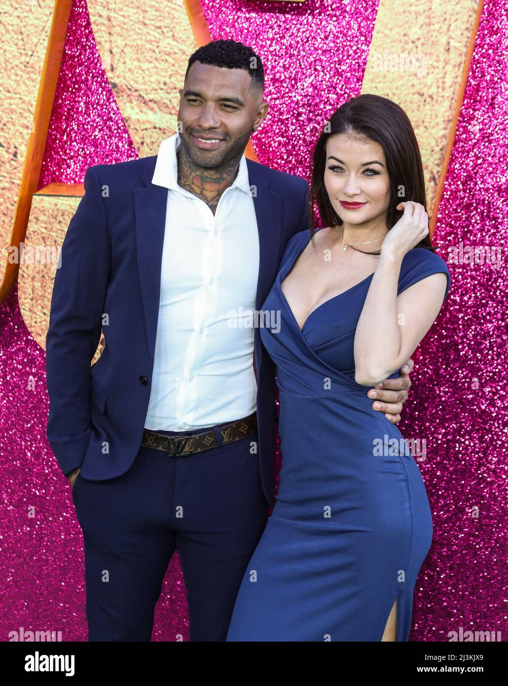 London, UK. 31st Mar, 2022. Jermaine Pennant and Jess Impiazzi attend ...