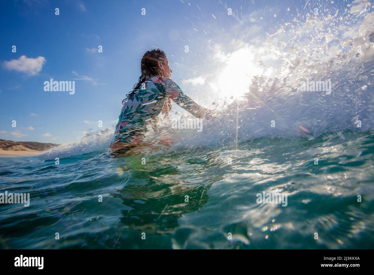 Surfer waiting right wave hi-res stock photography and images - Alamy