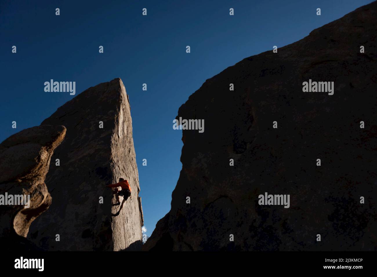 A climber on the 'Sharks Fin' formation Stock Photo - Alamy