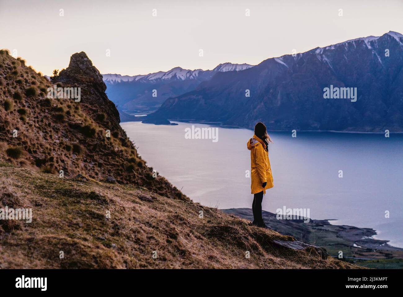 Person standing lake watching hi-res stock photography and images - Alamy