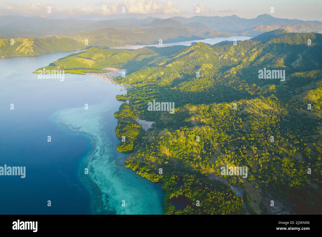 Aerial view of hazy sunlight over the Komodo Islands in the Komodo ...