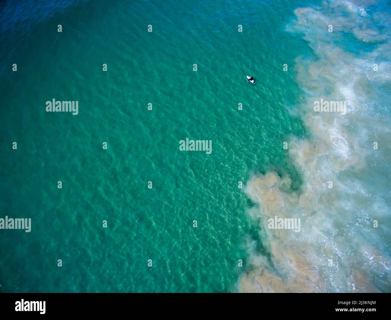 Aerial view of a surfer off Zuma Beach Stock Photo - Alamy