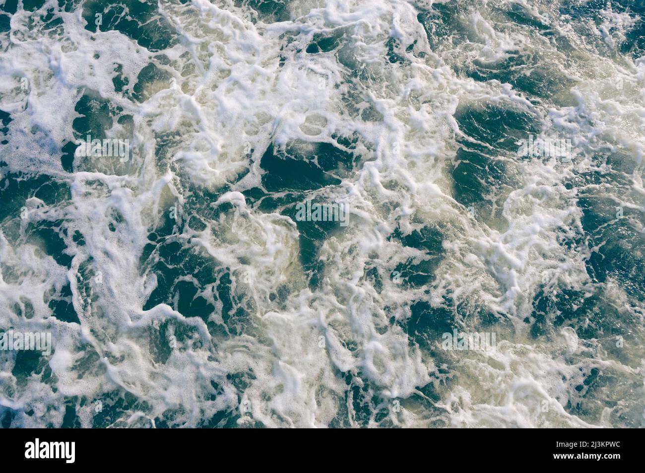 Swell with spume Stock Photo - Alamy