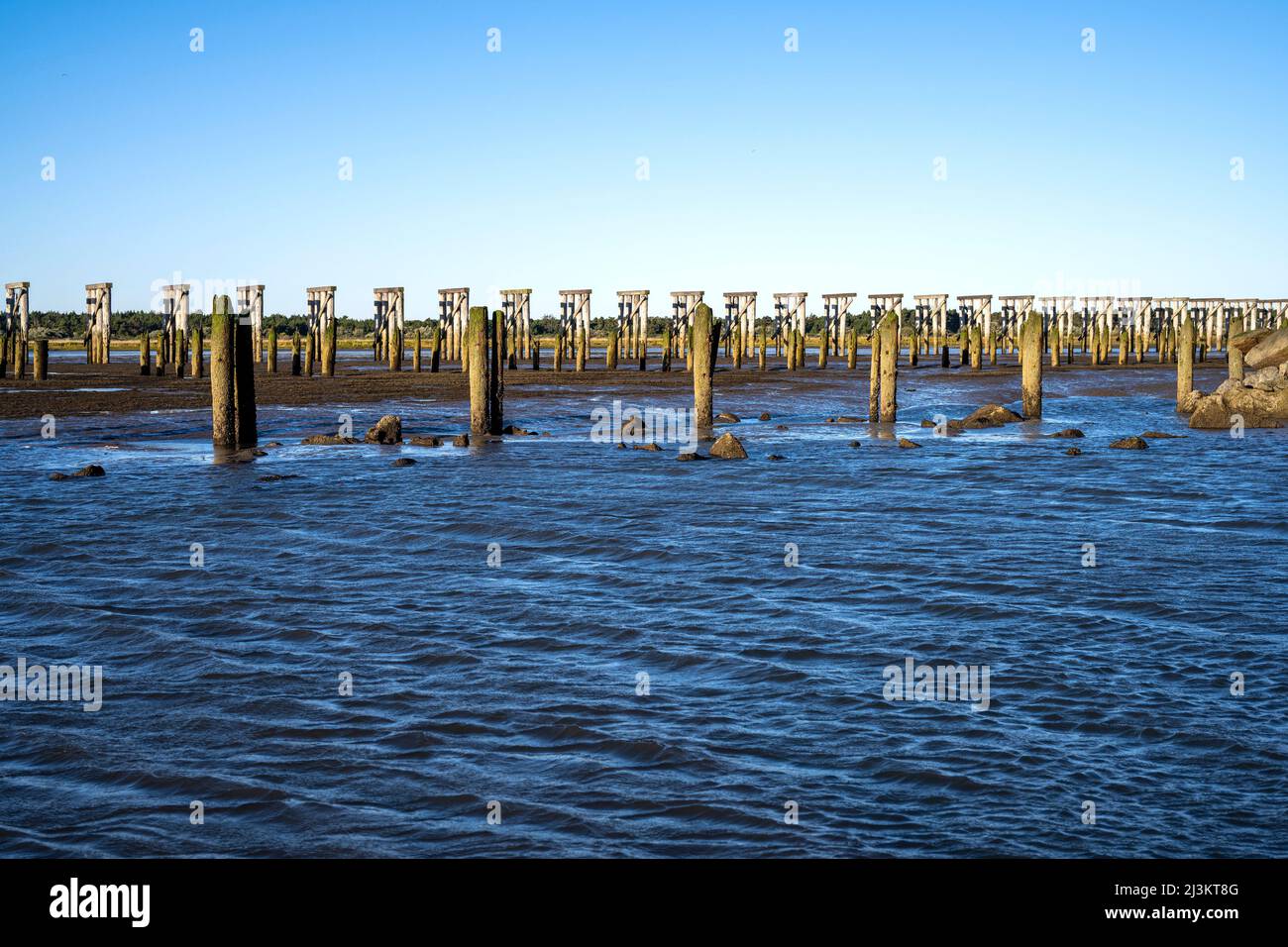 Wind ripples the surface of Trestle Bay at Fort Stevens State Park on ...