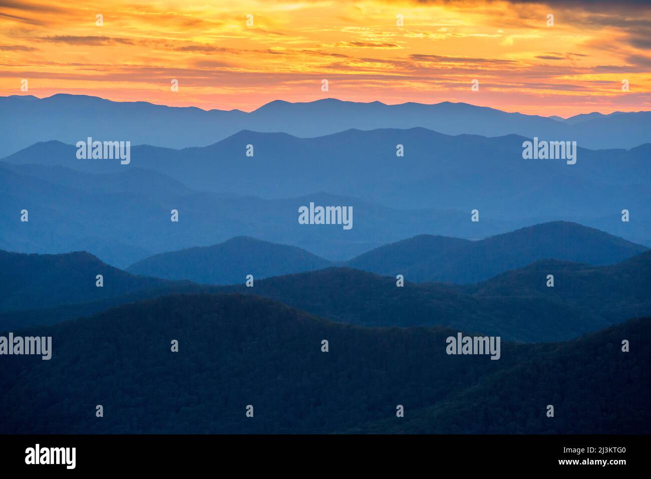 Blue Ridge Mountain ridgelines are visible at sunset; North Carolina ...