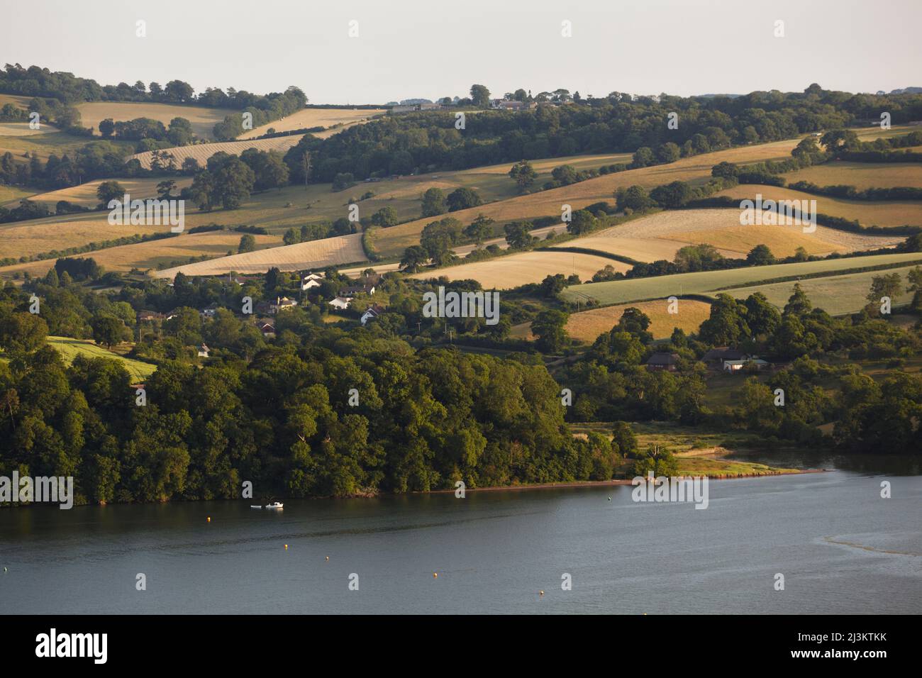 A summer riverside agricultural landscape in southern England.; River ...