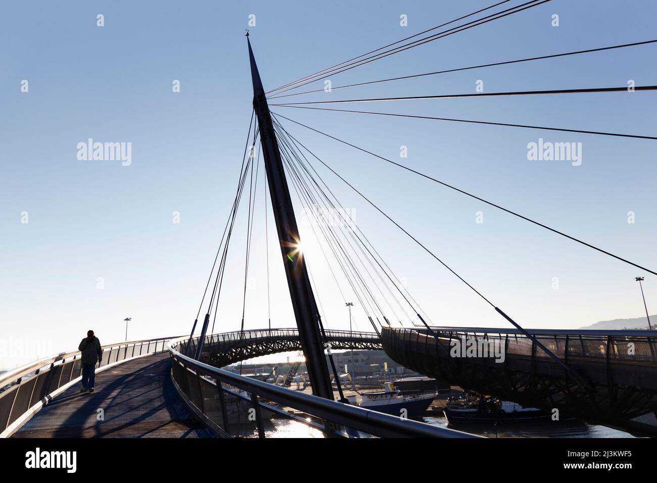 A silhouette of a foot and cycle bridge at Pescara, southern Italy ...