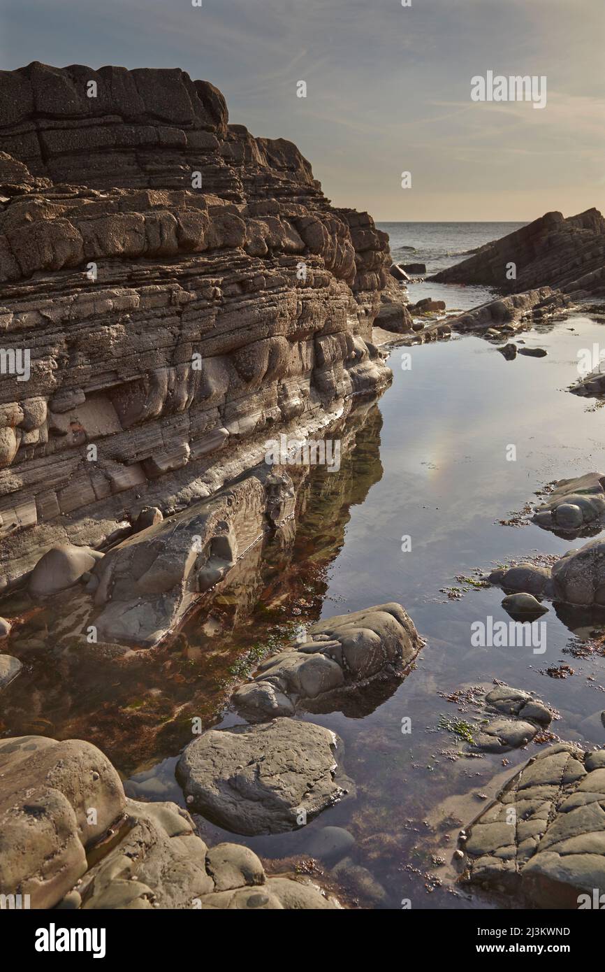 Rocks and a pool on the Atlantic coast, Devon, southwest England ...