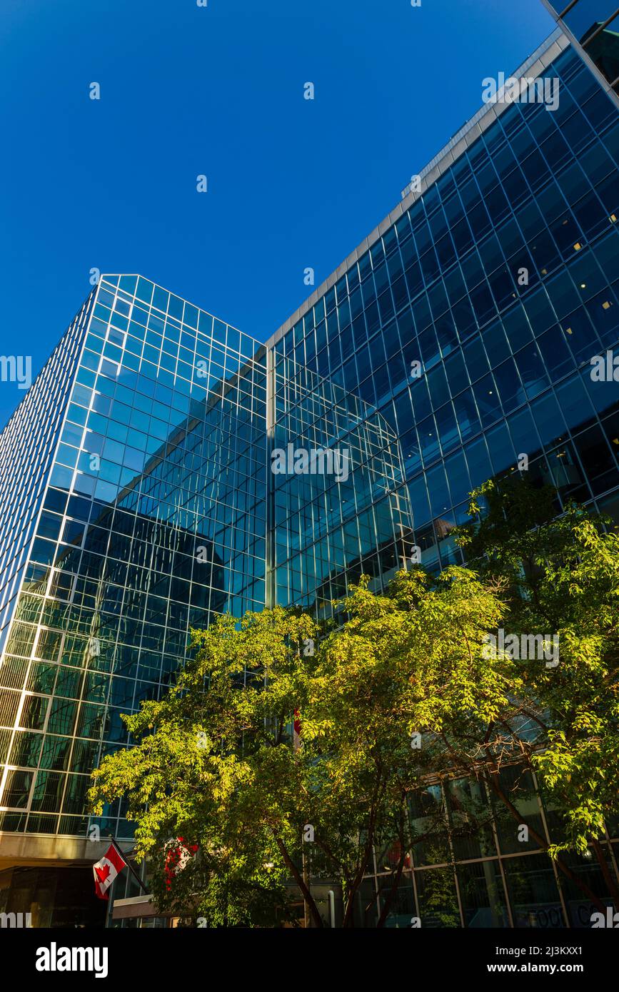Office buildings with glass facade and reflections, downtown Ottawa, Canada; Ottawa, Ontario ...