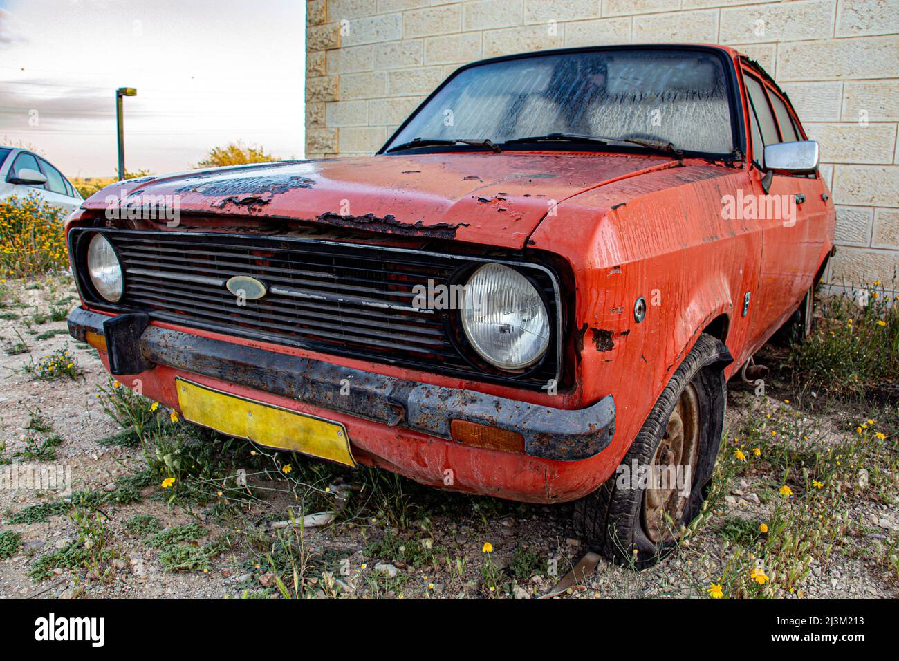 Rusty Old abandoned on a street intact car Stock Photo - Alamy