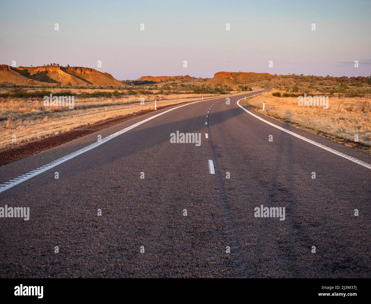 Sunrise on the Great Northern Highway near the Ngumpan Cliffs ...