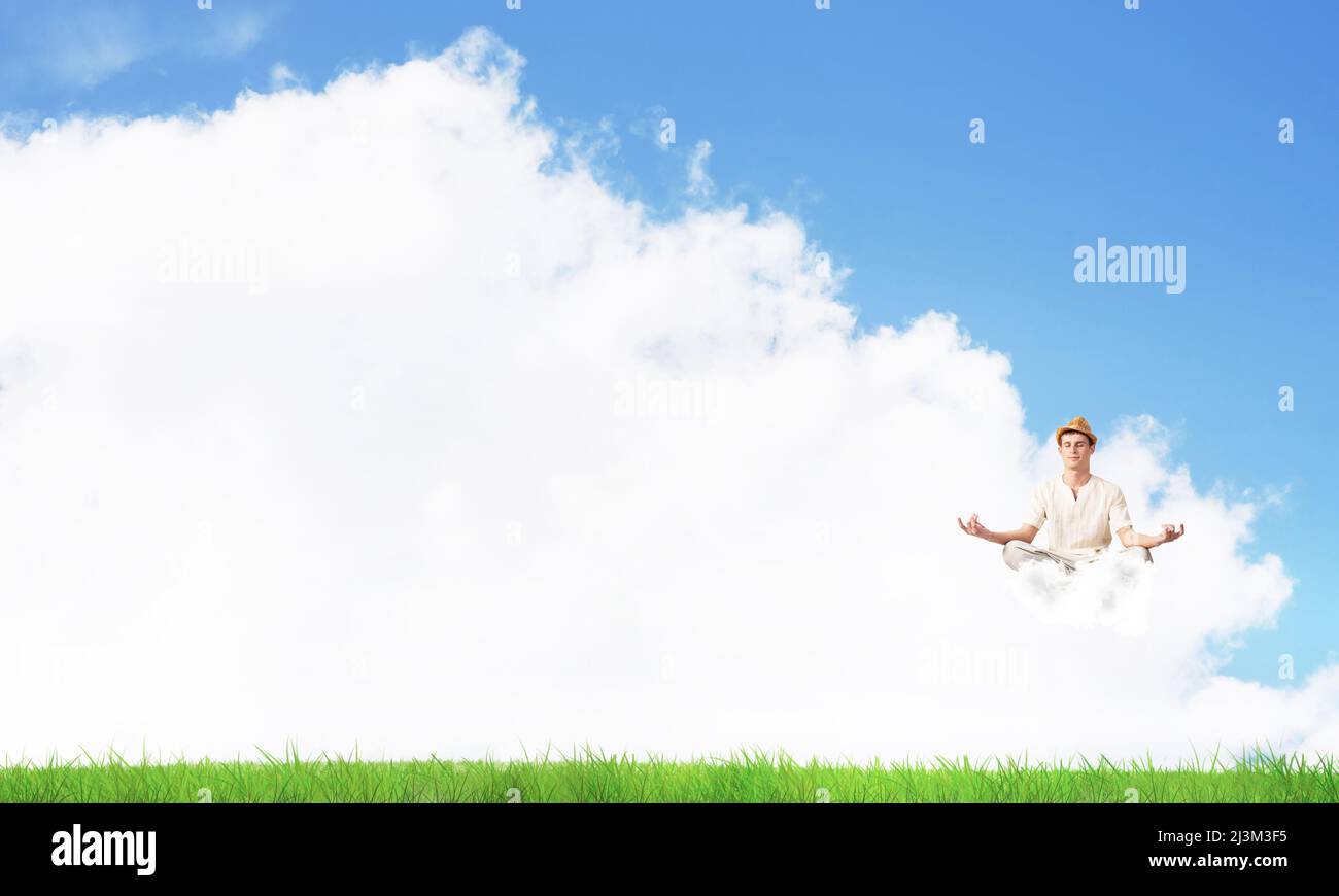 Young man keeping mind conscious Stock Photo - Alamy