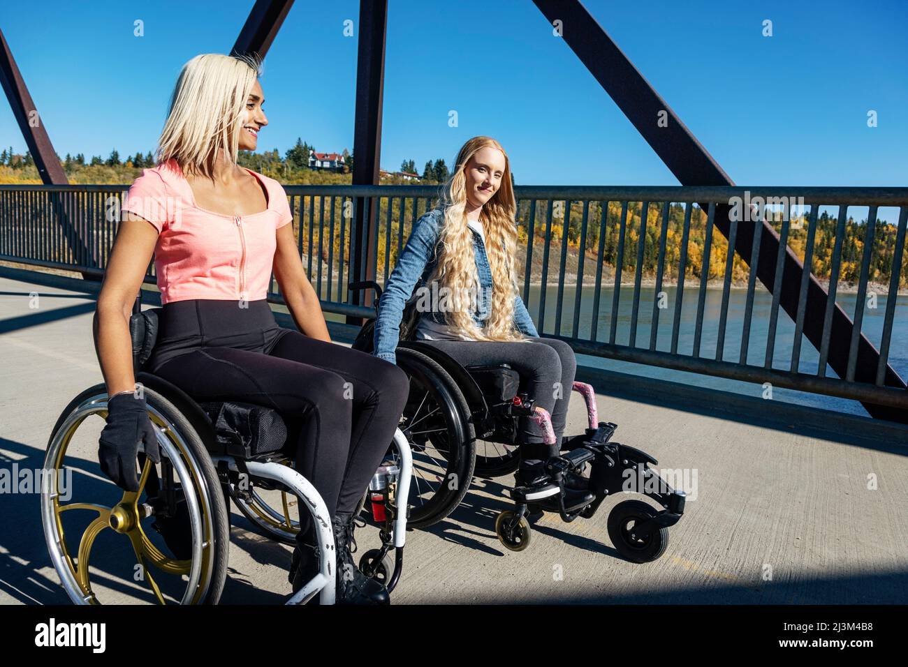 Two people in wheelchairs hi-res stock photography and images - Alamy