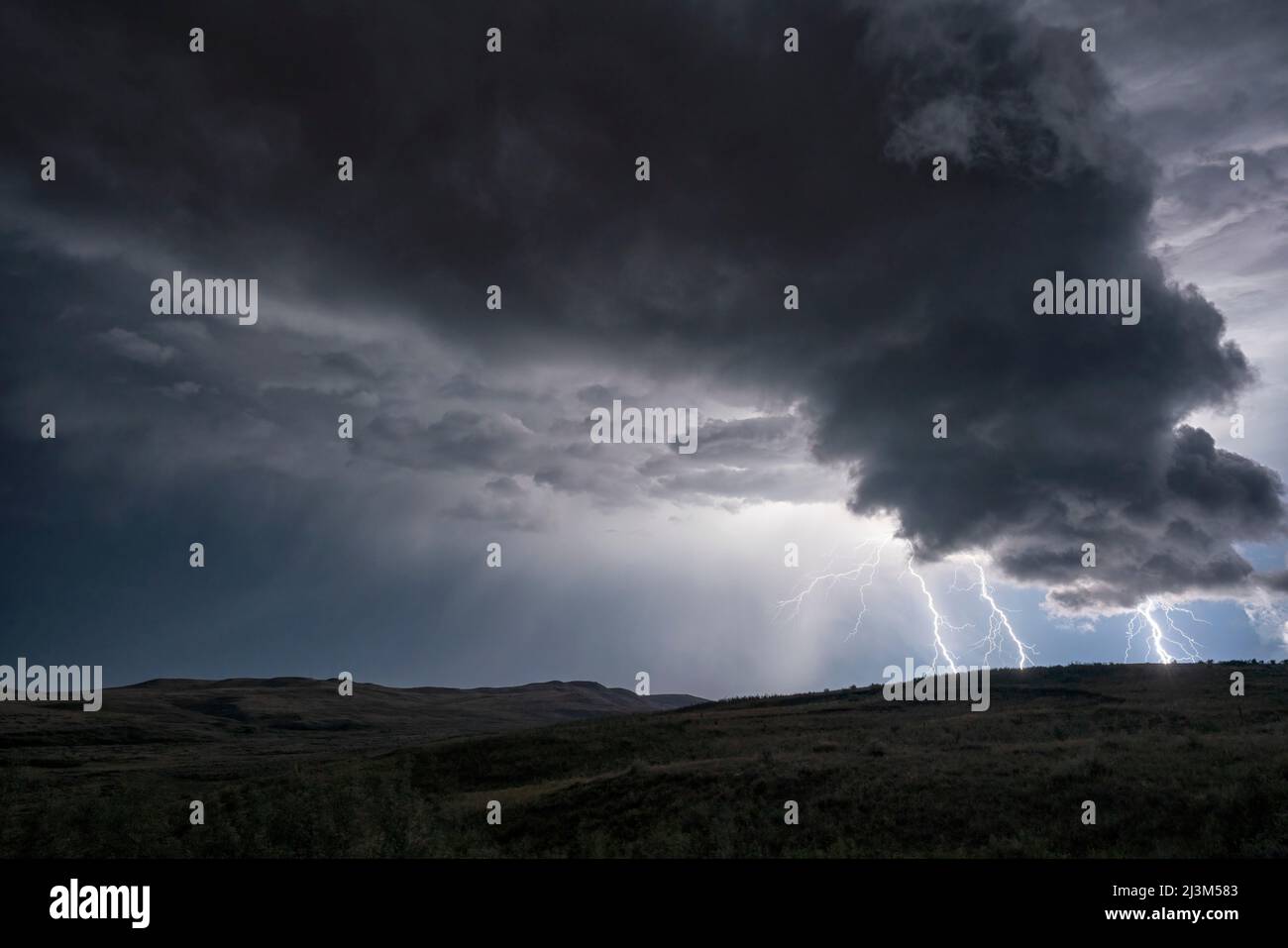 Lightning strikes from a passing supercell thunderstorm; Saskatchewan ...