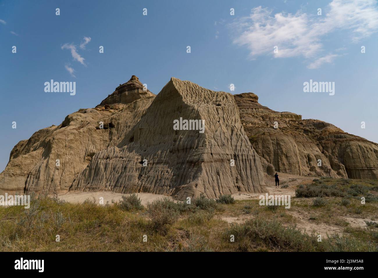 Woman hiking around Castle Butte in Big Muddy Badlands of Southern ...