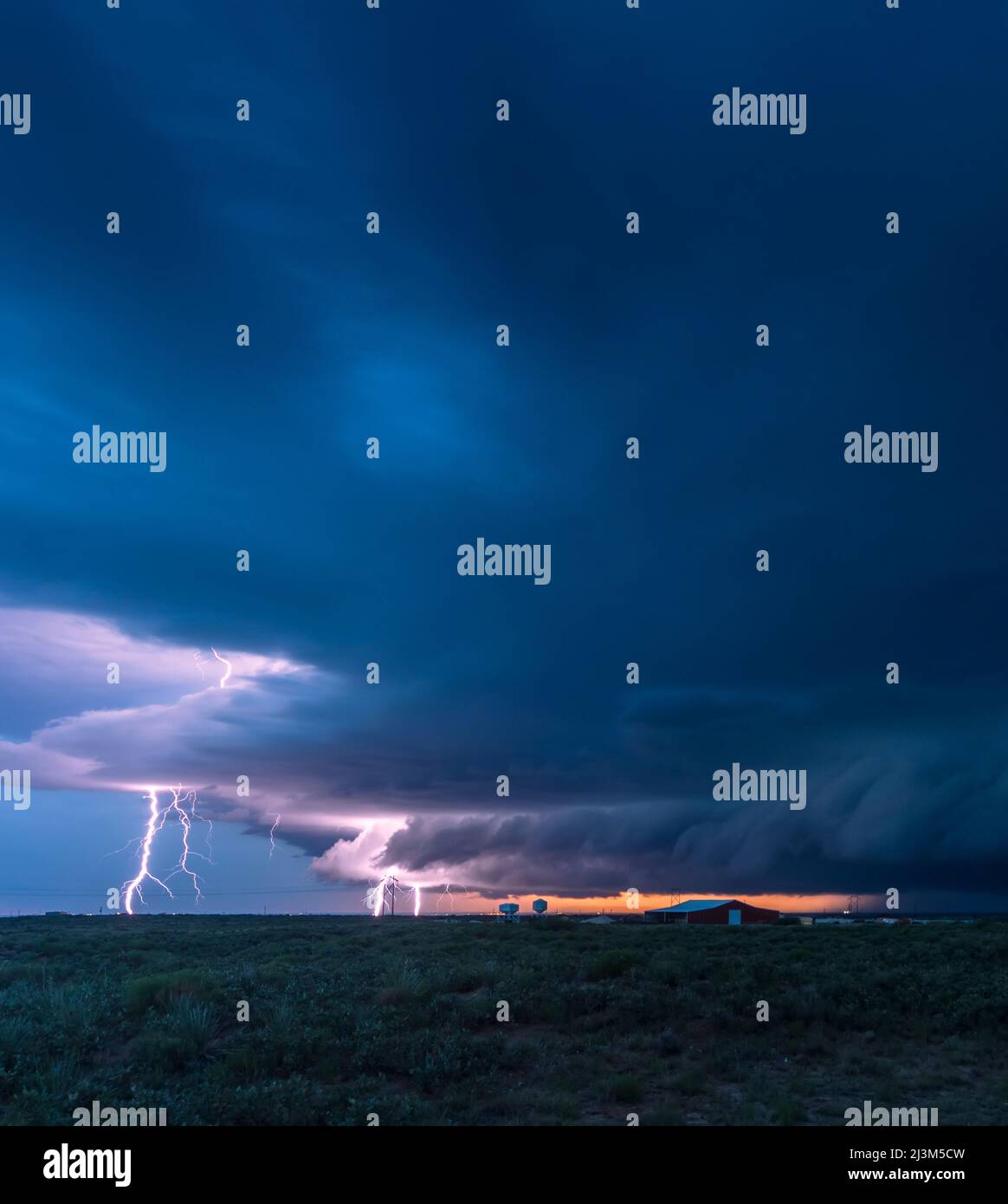 Lightning strikes from a supercell thunderstorm over the oil fields of ...