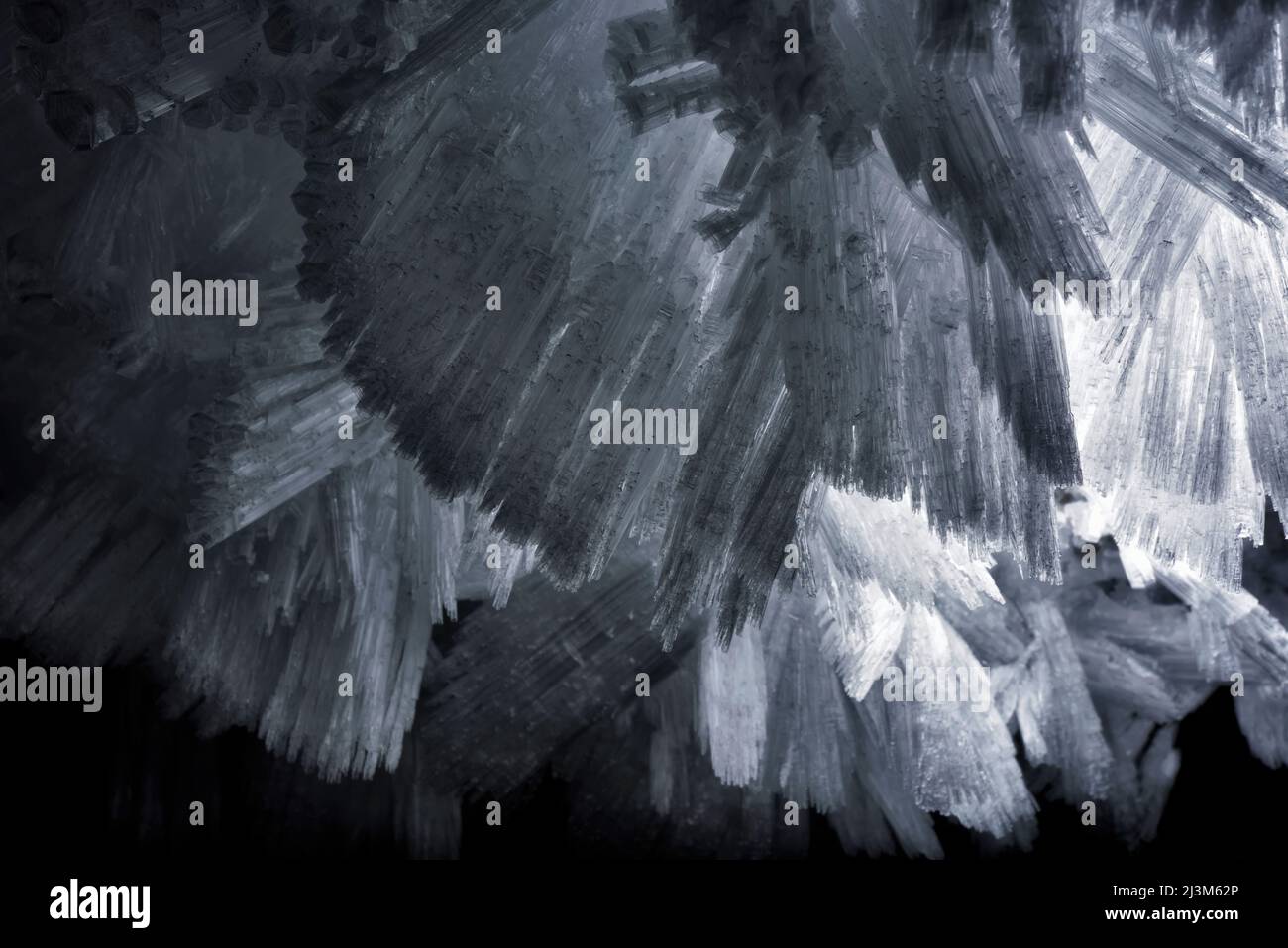 Detail photograph of the giant ice crystals clinging to the walls and ...