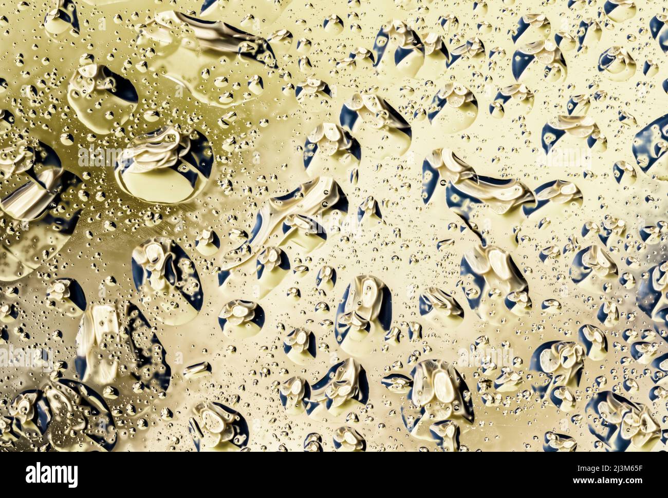 Abstract irregular water drops macro showing reflected colours Stock ...