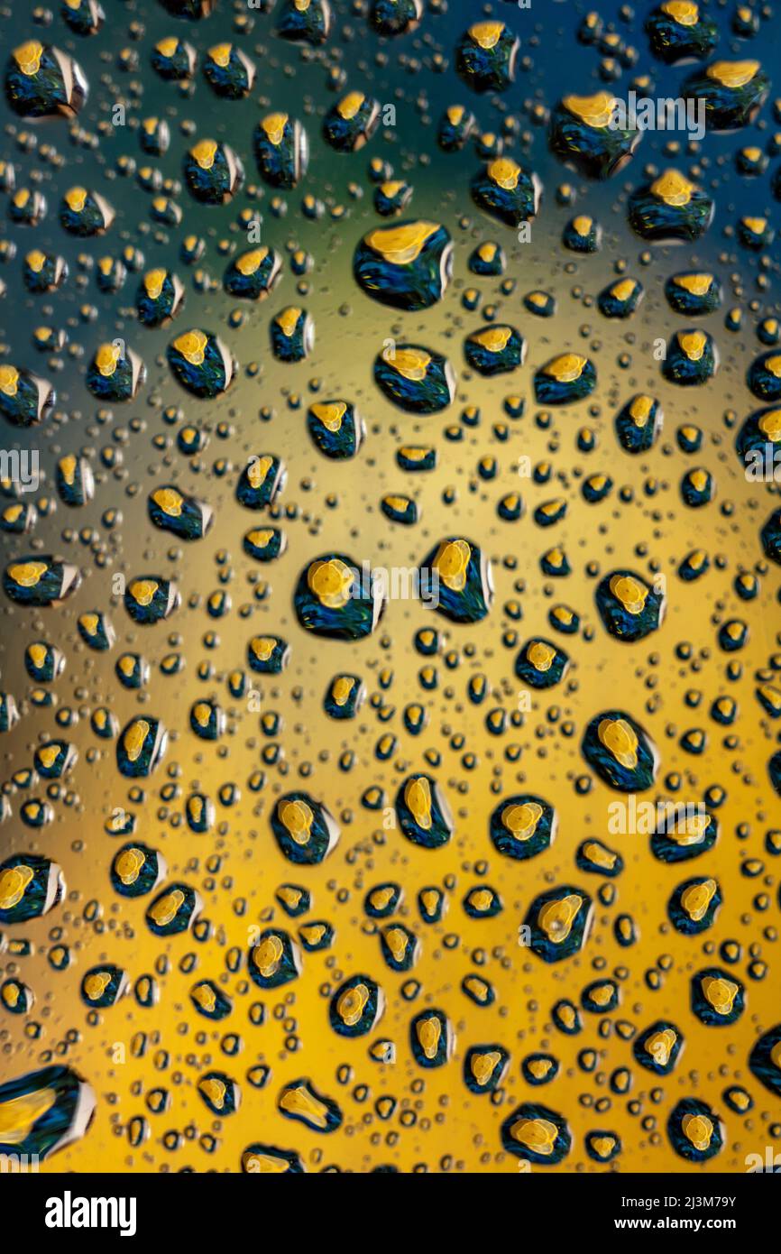 Abstract irregular water drops macro showing reflected colours Stock ...