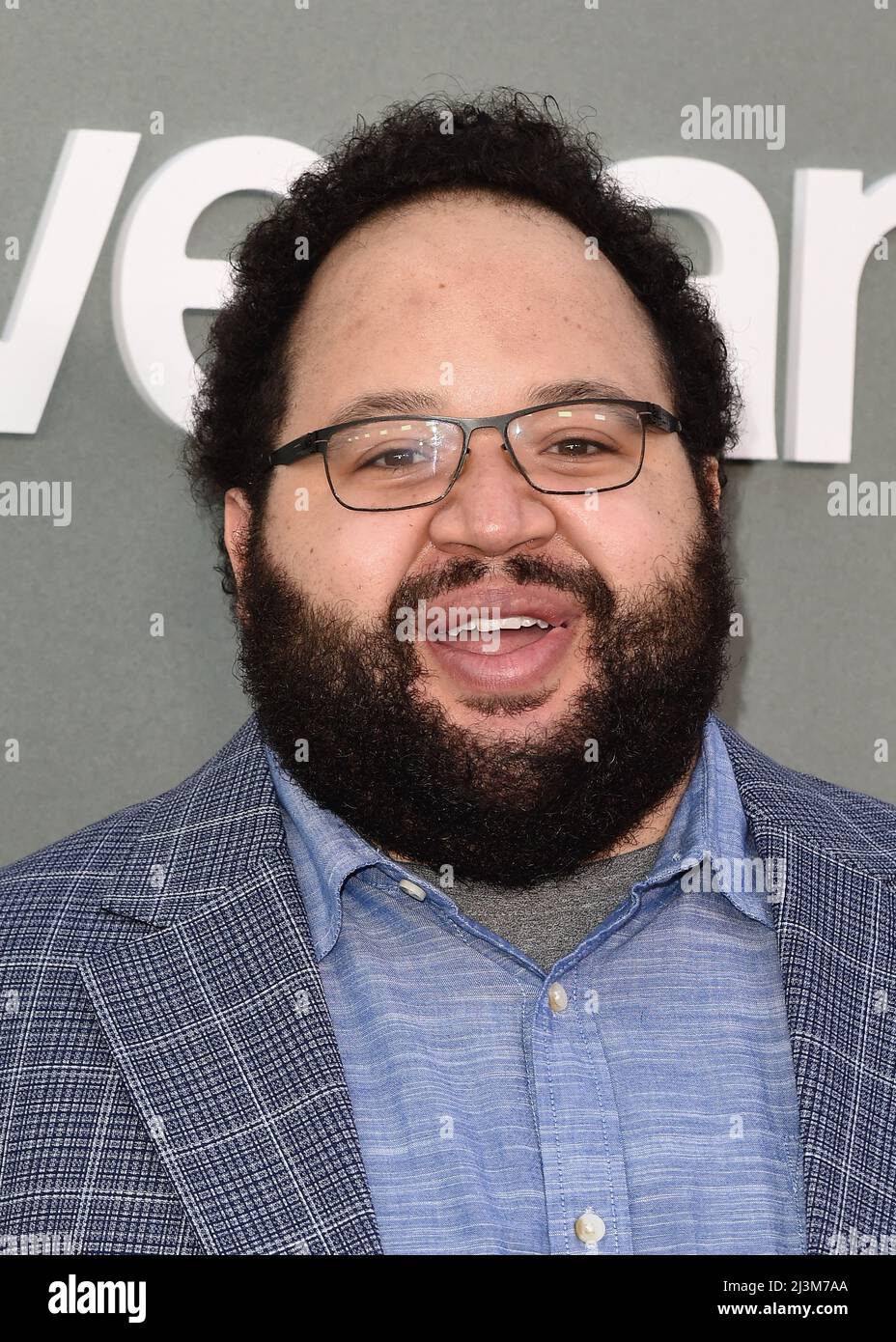 Zach Cherry walking on the red carpet at Apple Original Series ...