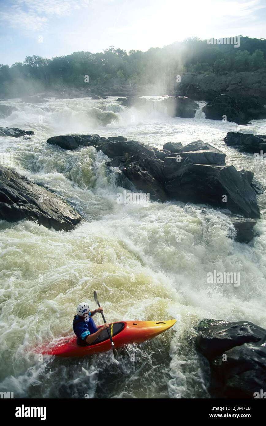 Kayaker running Maryland side of Great Falls on the Potomac River ...