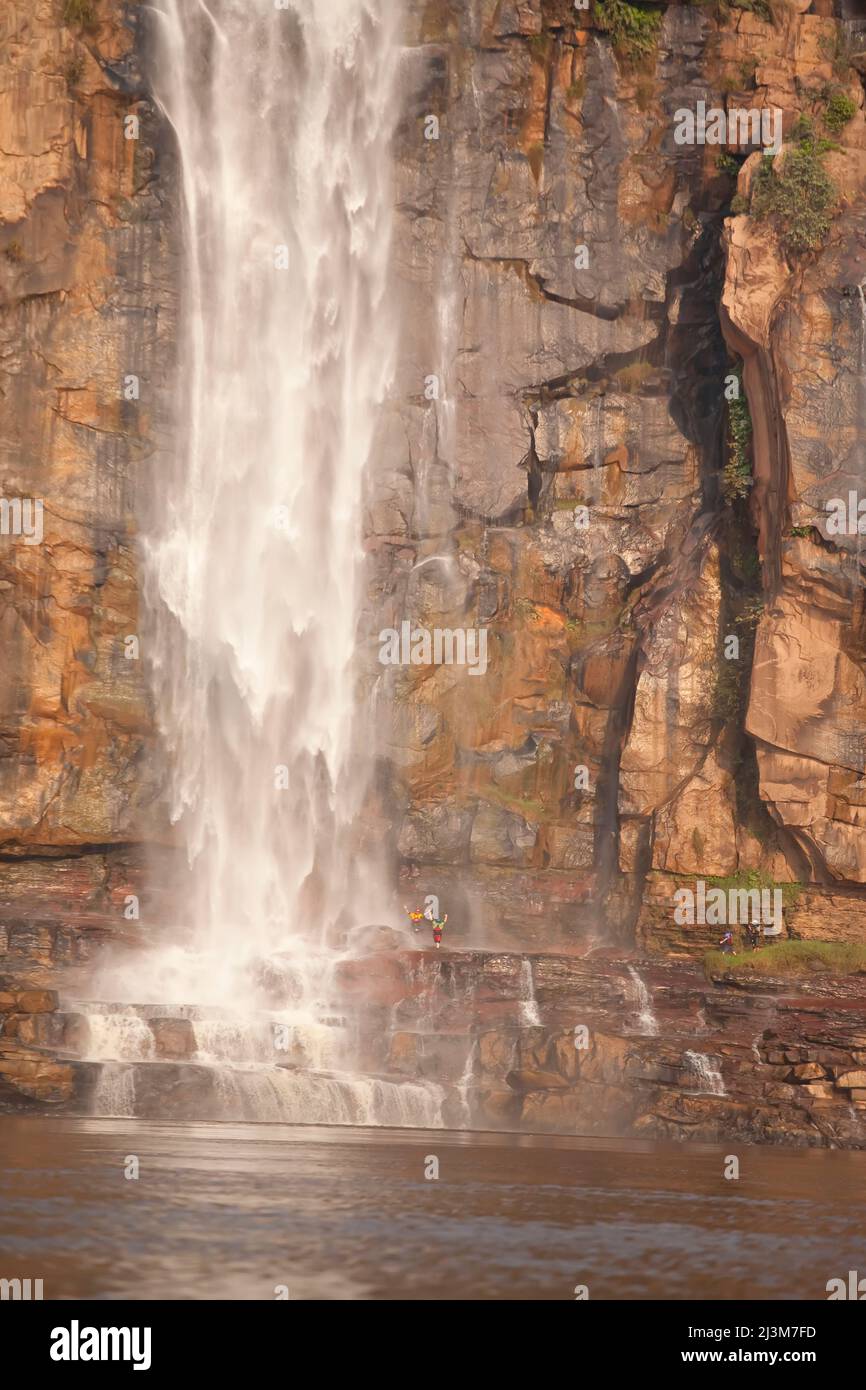 Kayakers exult at the base of a big waterfall in the String of Pearls ...
