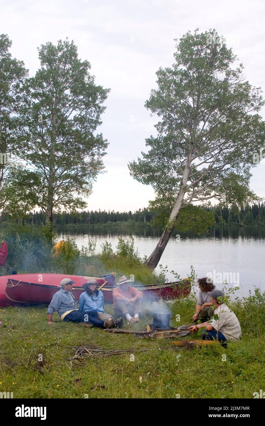 Canoeists cooking campfire on the winisk river hi-res stock photography ...