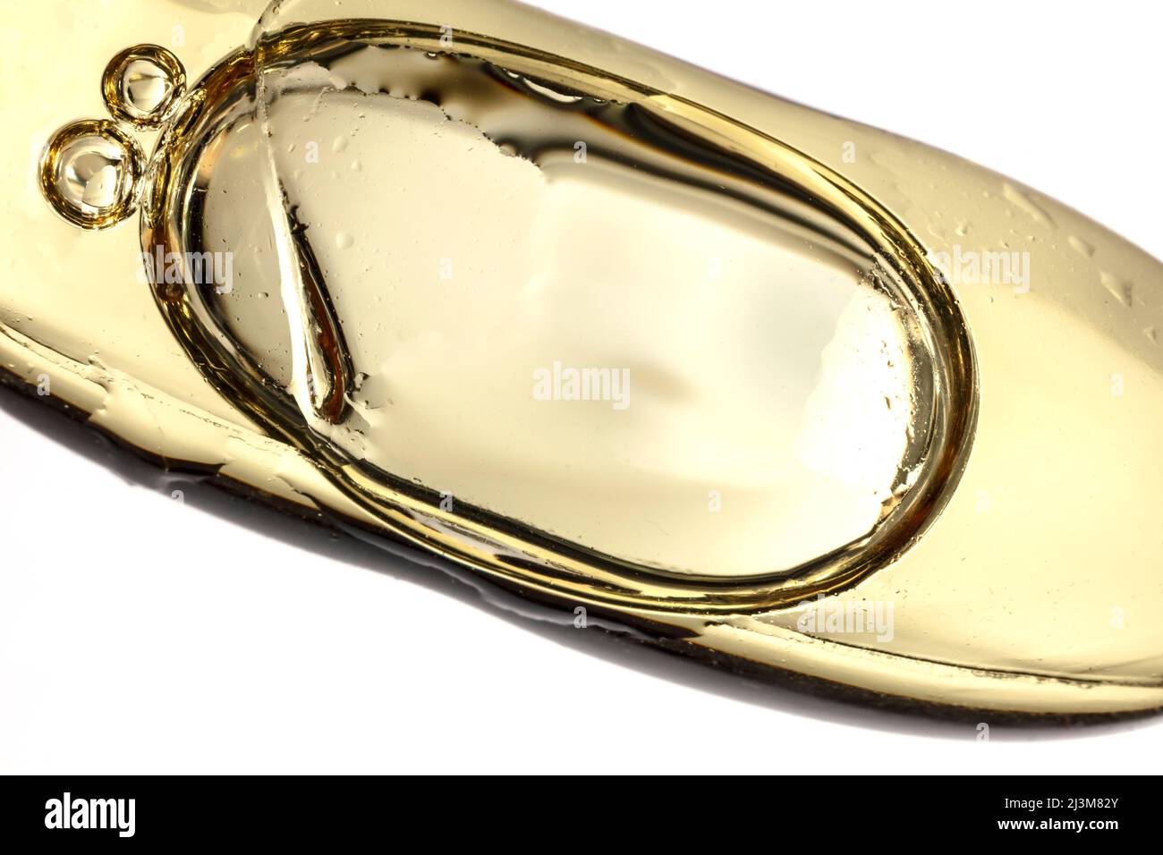 Macro still-life showing abstract patterns in Omega-3 oil capsule ...