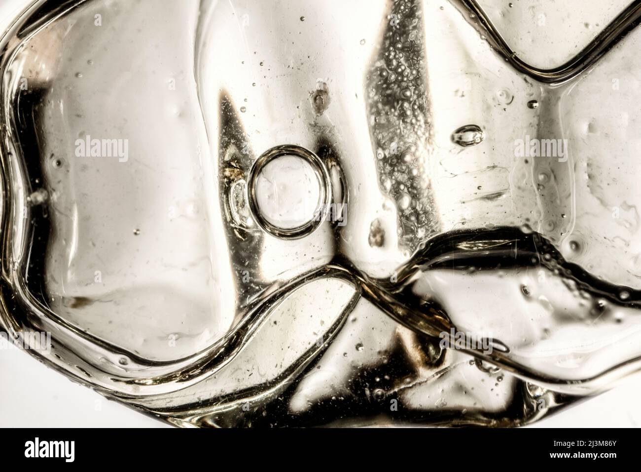 Macro still-life showing abstract patterns in Omega-3 oil capsule ...