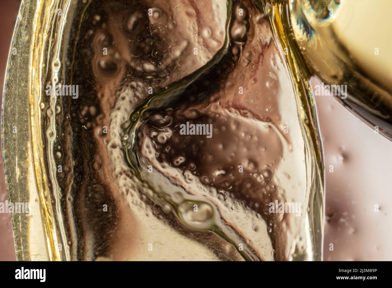 Macro still-life showing abstract patterns in Omega-3 oil capsule ...