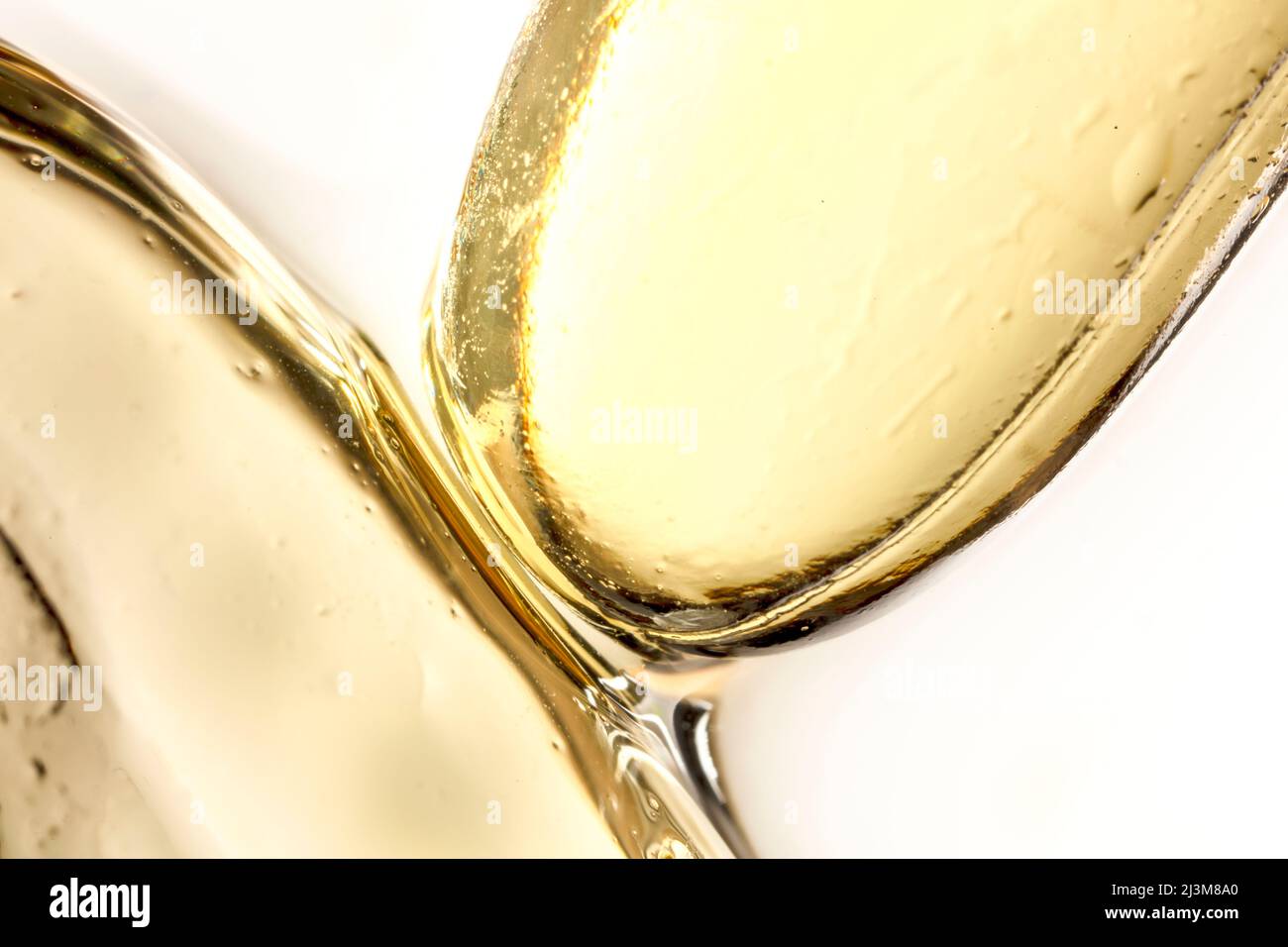 Macro still-life showing abstract patterns in Omega-3 oil capsule ...