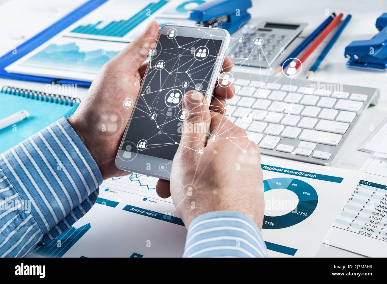 Men's hands hold a mobile phone Stock Photo - Alamy